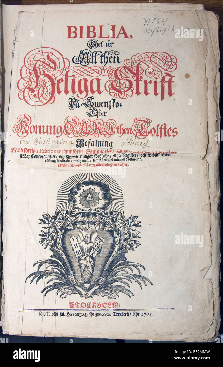 First page in a Swedish bible from 1703. On the bottom half is a ...