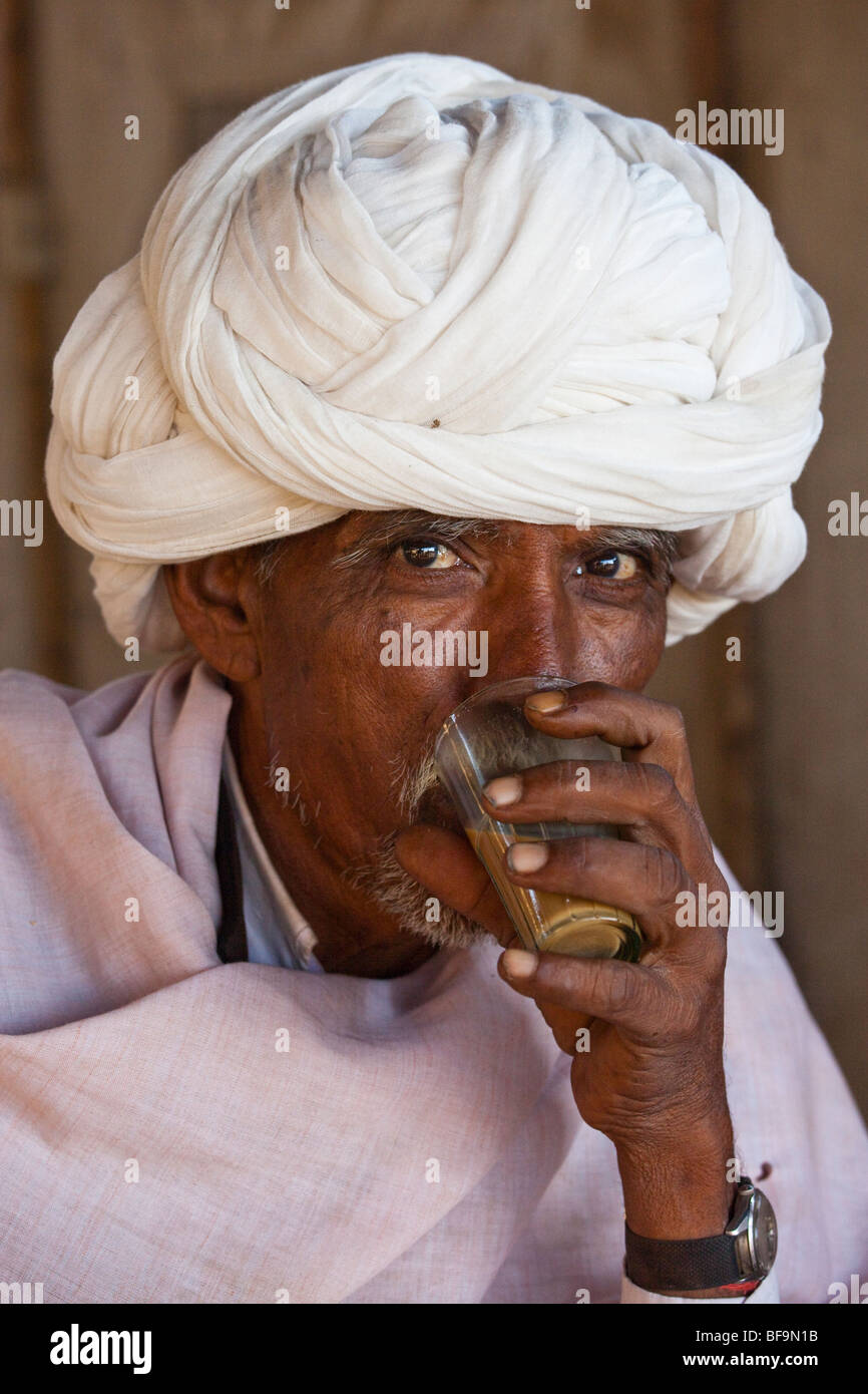 Portrait of indian man drinking chai hi-res stock photography and ...