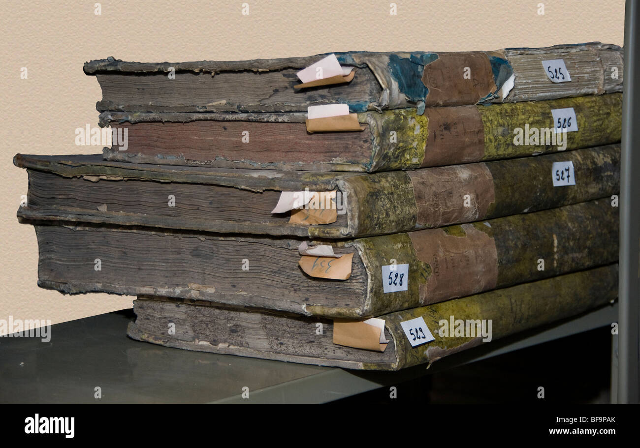 Stack of 5 old registers on shelf Stock Photo - Alamy