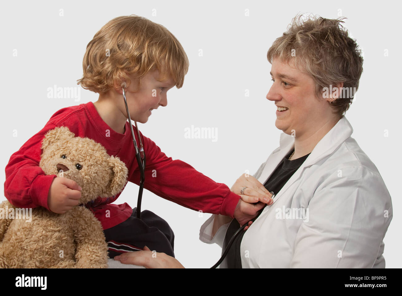 Child with lady doctor Stock Photo - Alamy