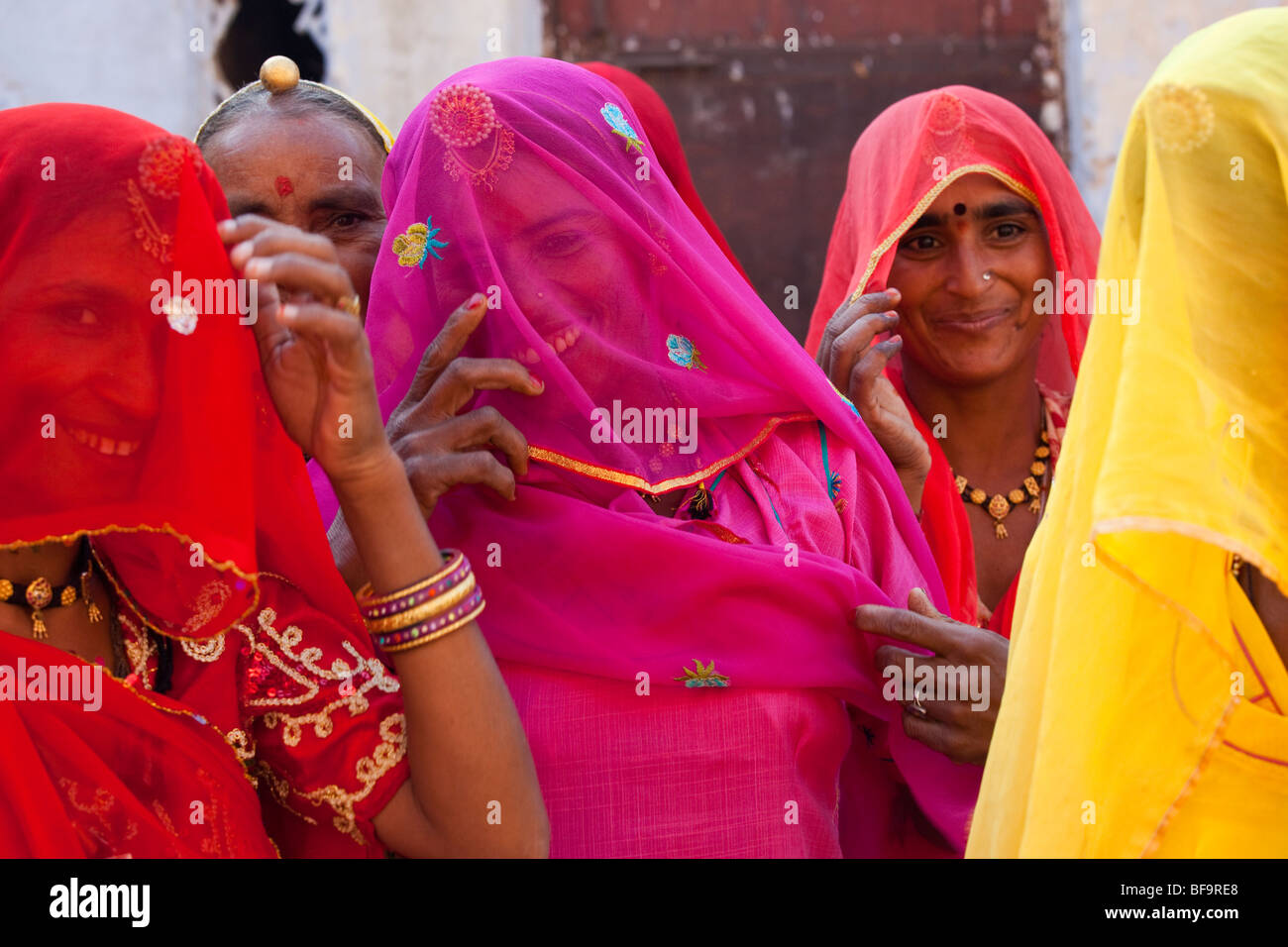 Veiled Rajput women at the Camel Fair in Pushkar in Rajasthan India ...