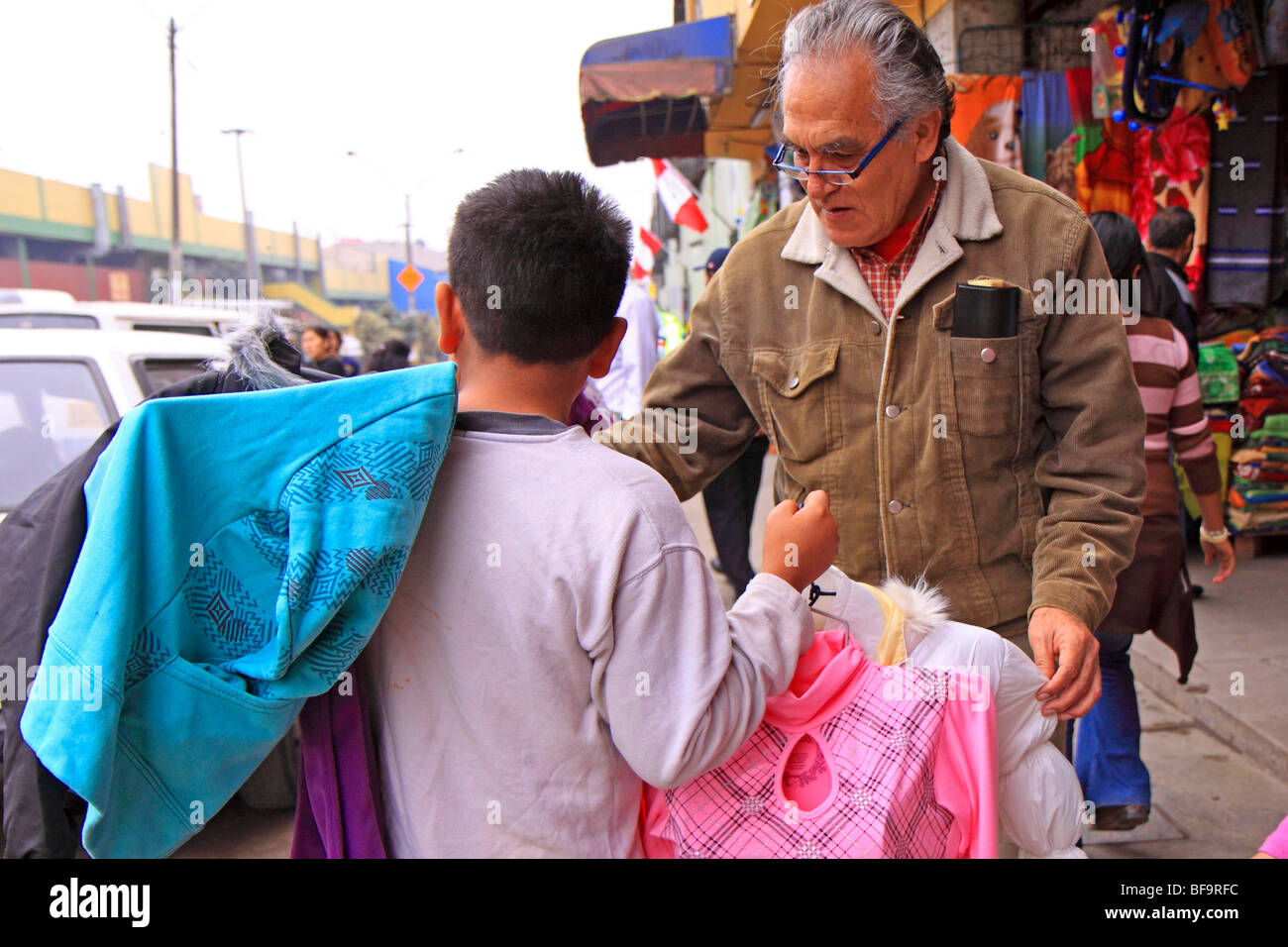 young boy working in the streets of Lima, Peru Stock Photo - Alamy