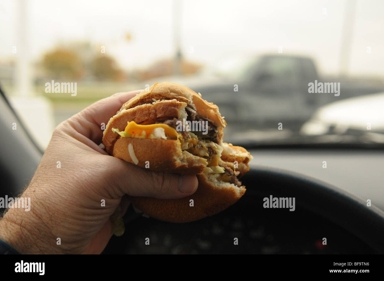 Driver eating lunch hi-res stock photography and images - Alamy