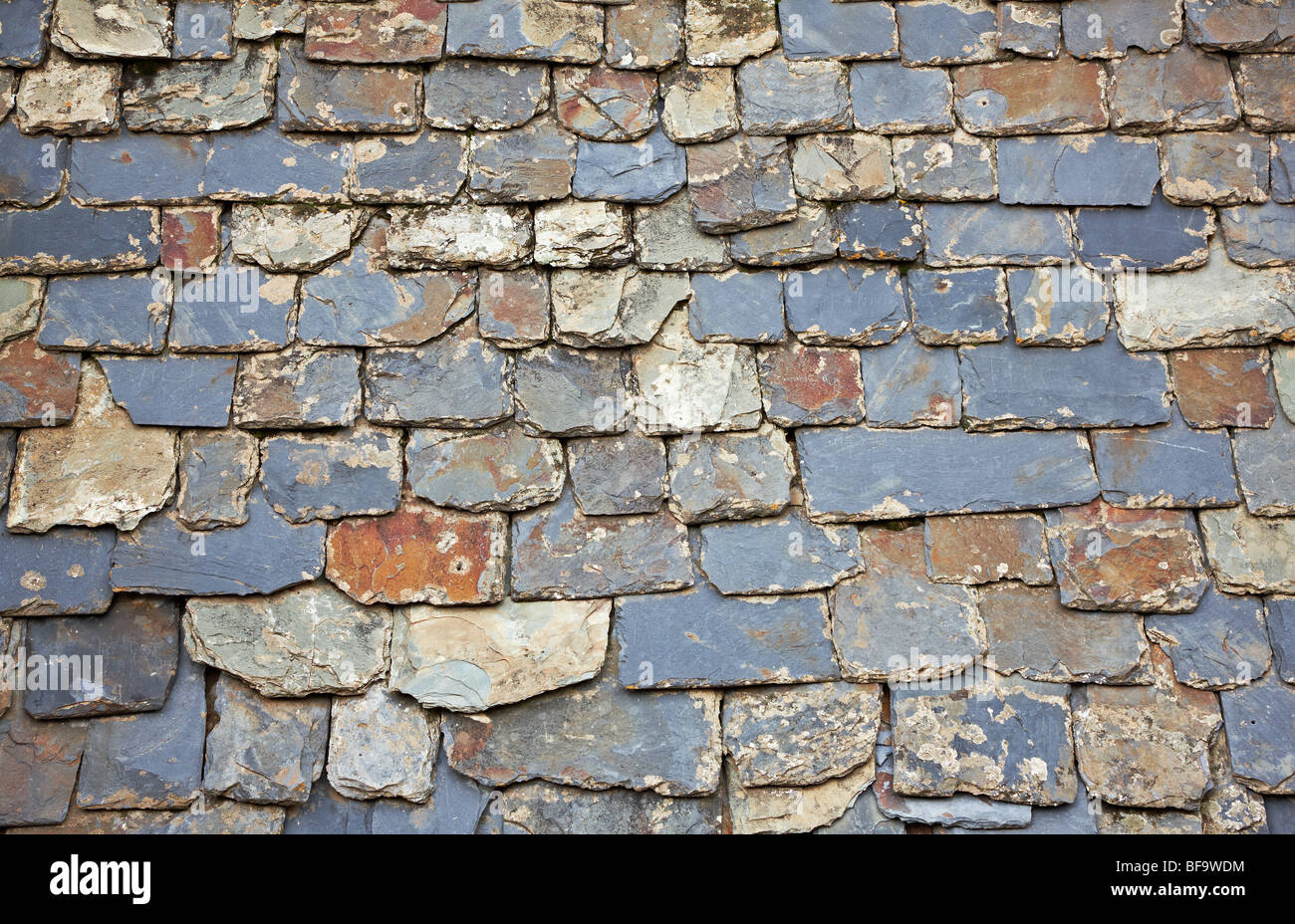 Close up of slate roof tiles background Stock Photo - Alamy