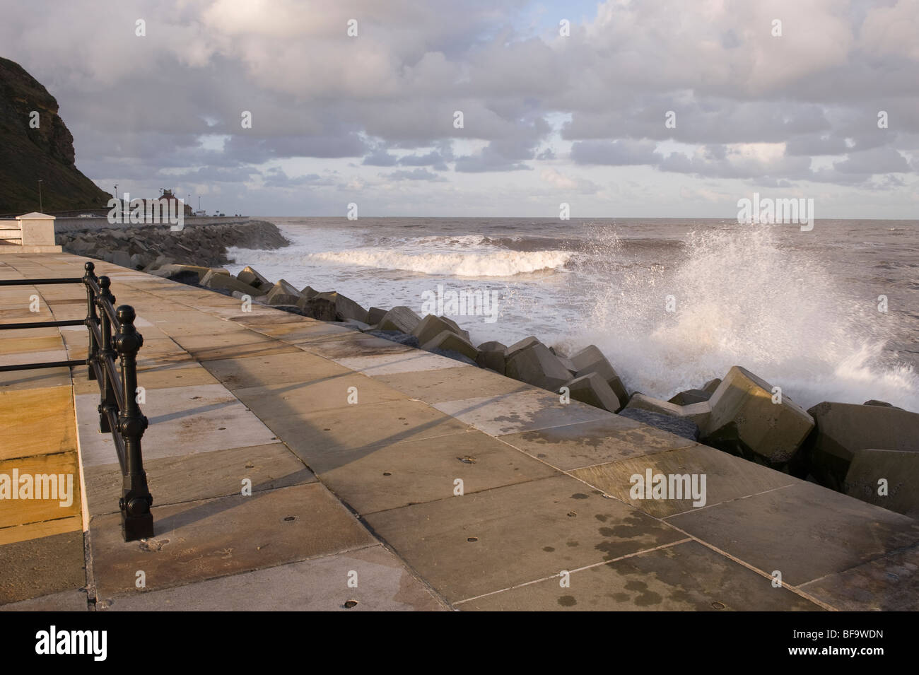 The North Sea crashes against the sea defences at Scarborough, North ...