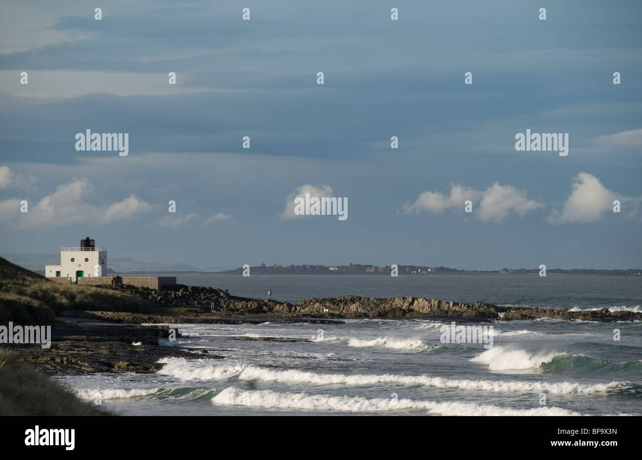 Lighthouse at Harkness Rocks, Bamburgh on the Northumberland coast ...