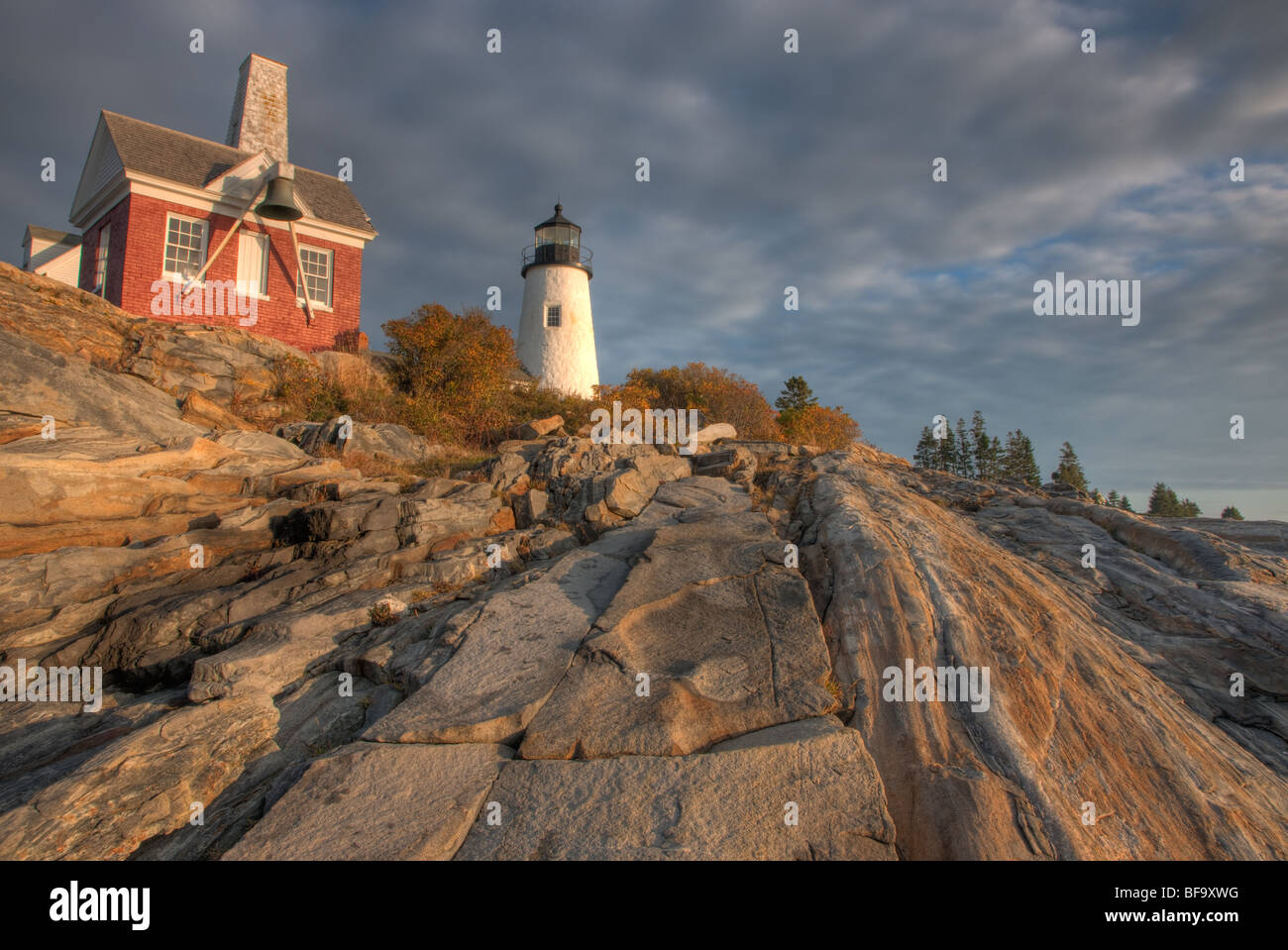 Pemaquid Point Lighthouse and bell house perched on fantastic rock ...