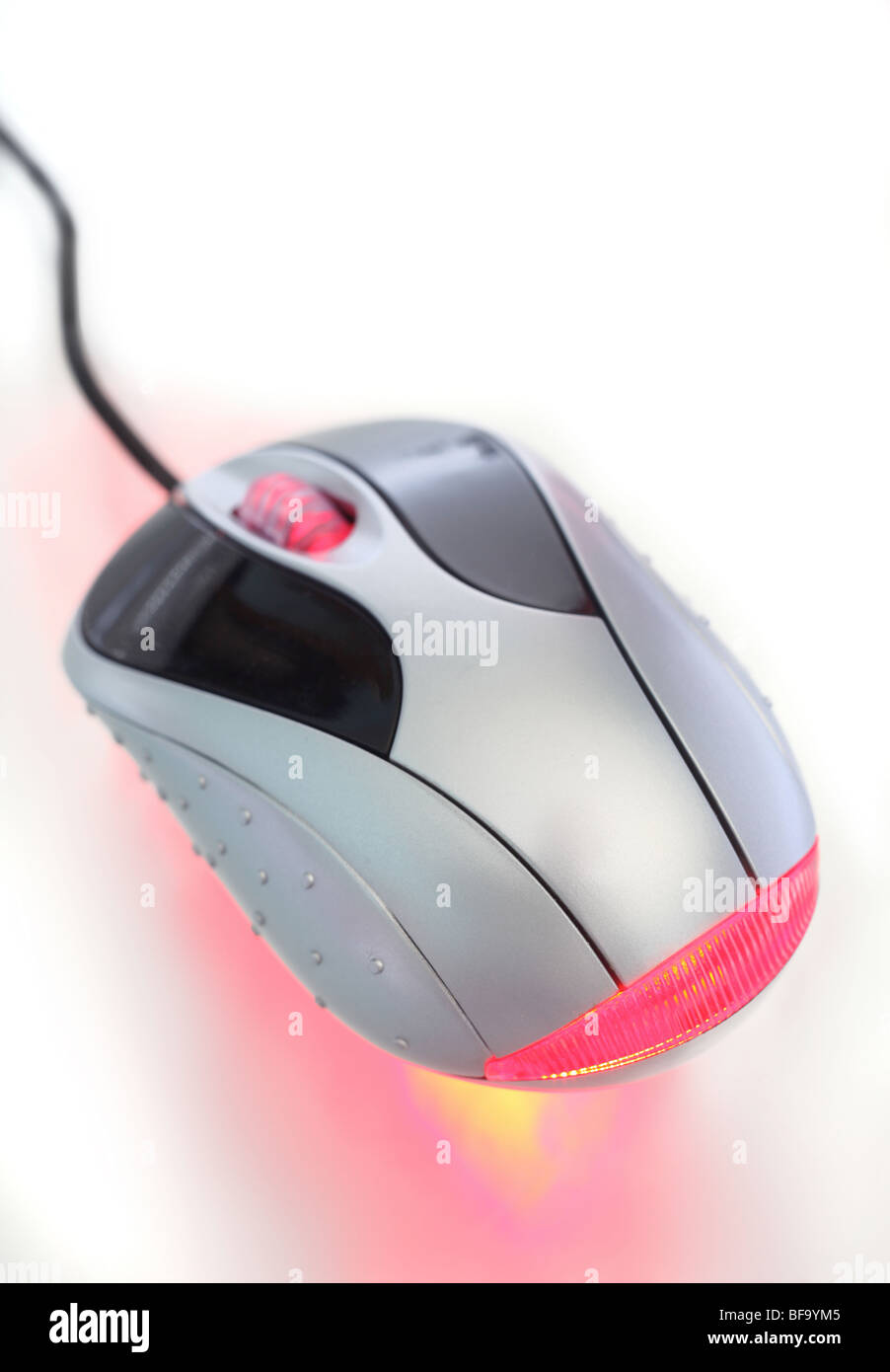 View of an optical wheel mouse lit from below with its own glow Stock ...