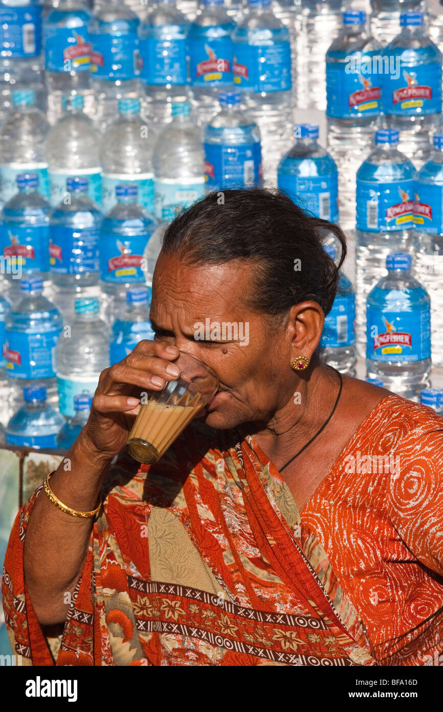Indian woman drinking water india hi-res stock photography and images ...