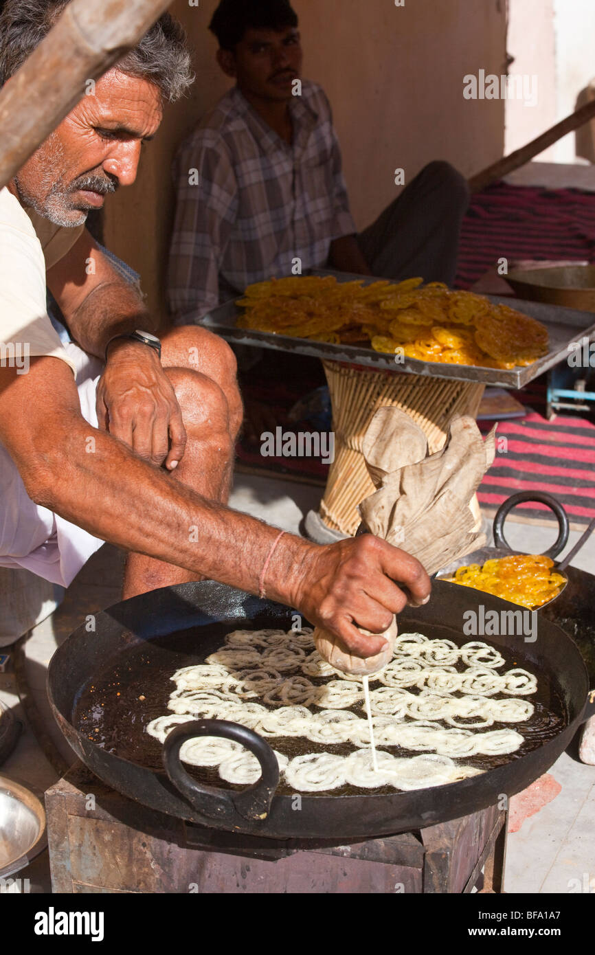 Deepfrying sweets in Pushkar India Stock Photo - Alamy