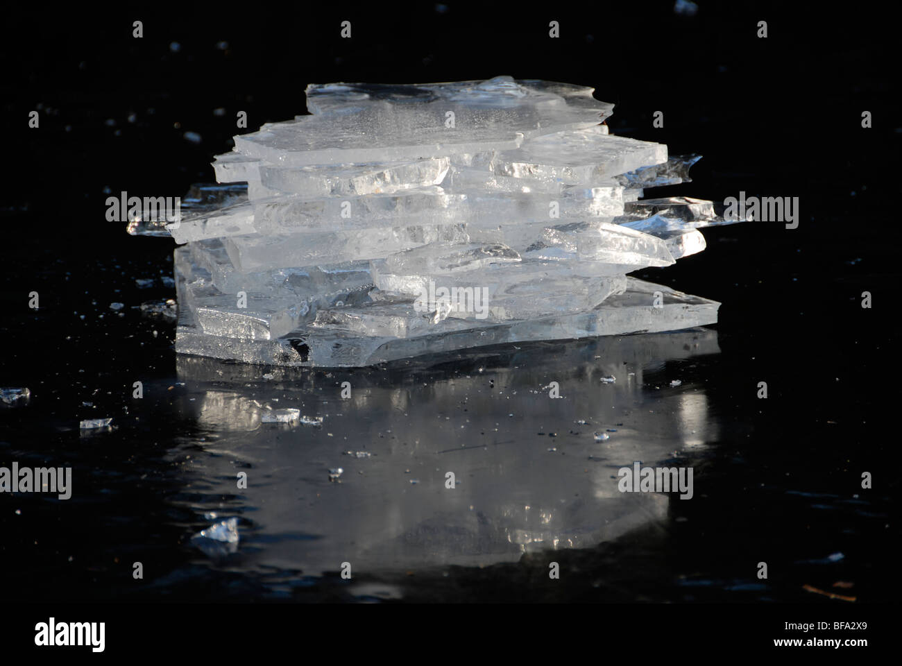 A stack of broken ice on a frozen pond Stock Photo - Alamy