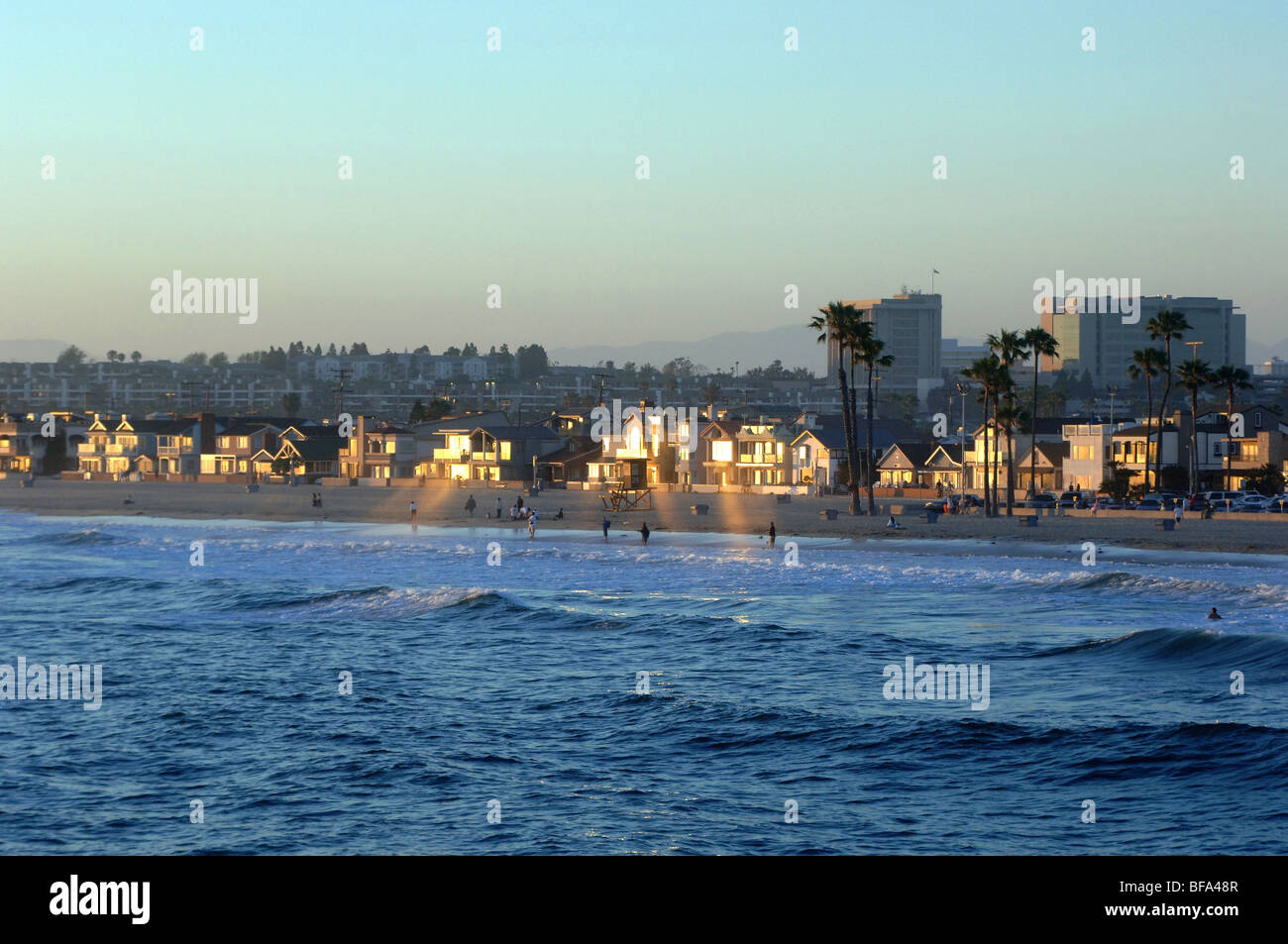 Photograph of luxurious waterfront homes near the Newport Beach Pier ...