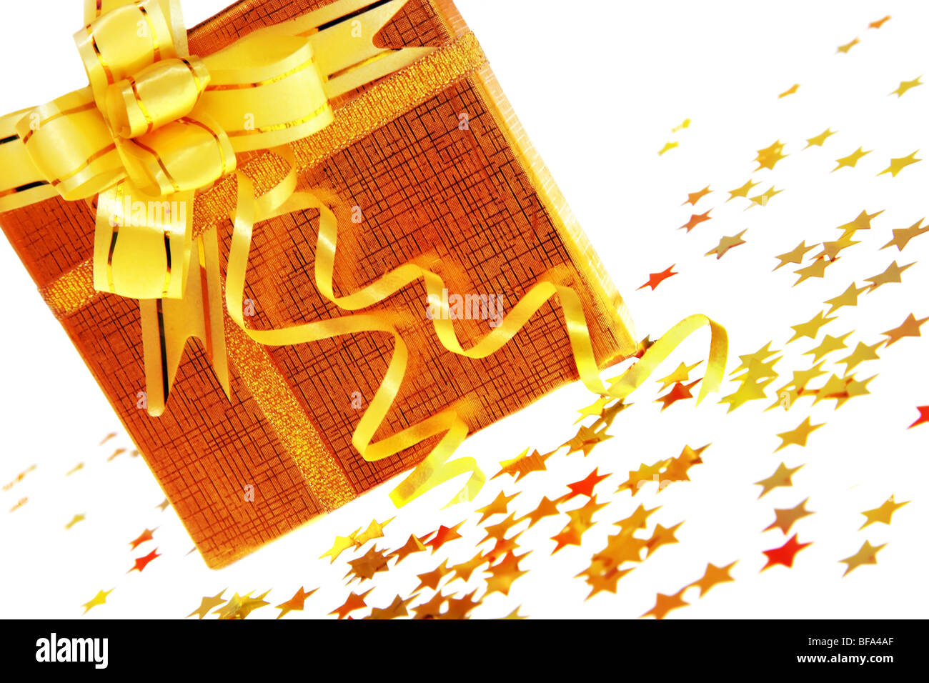 Gift box with stars against white background Stock Photo - Alamy