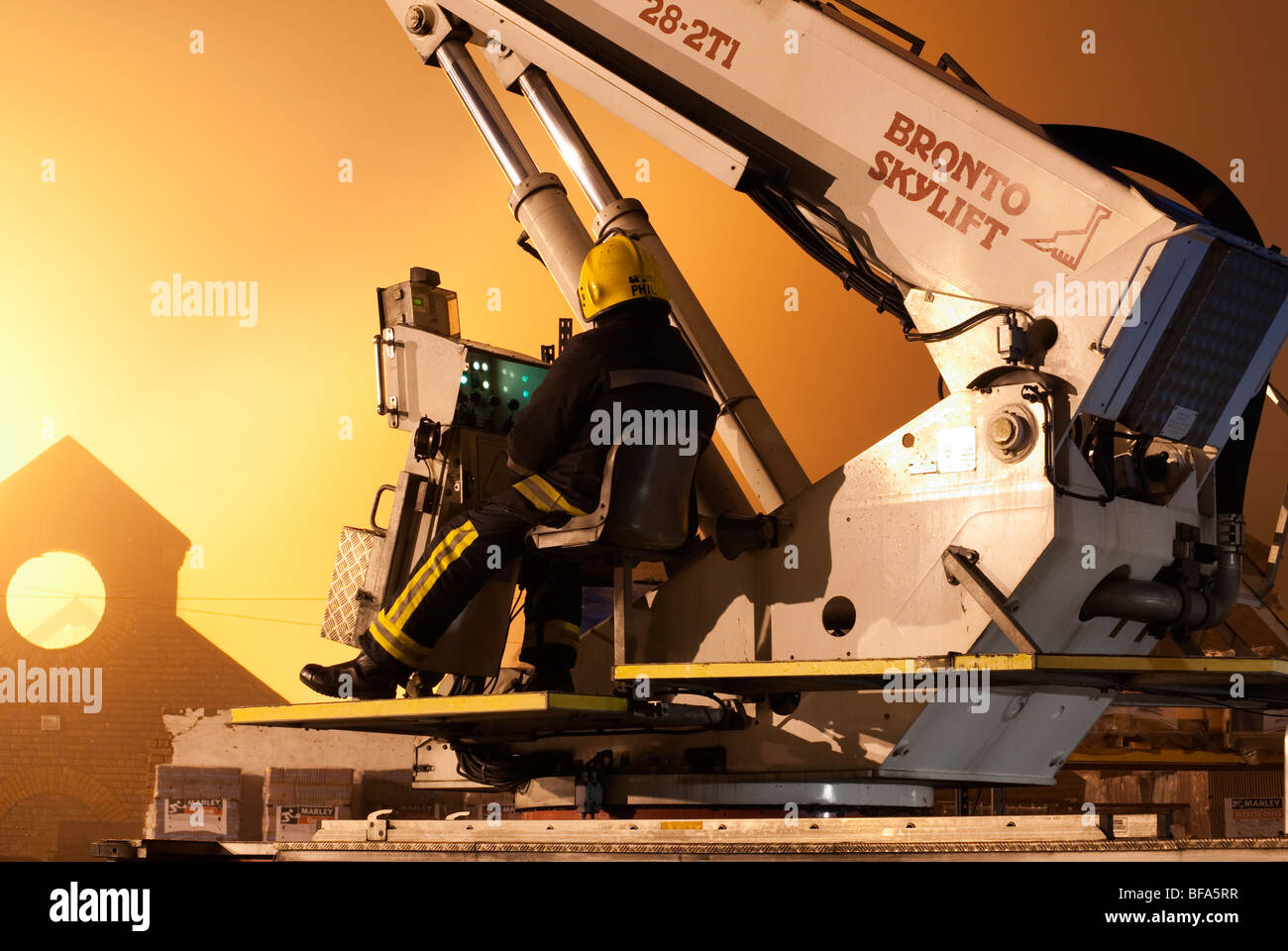 Fire Service Hydraulic Platform operator at building fire Stock Photo ...