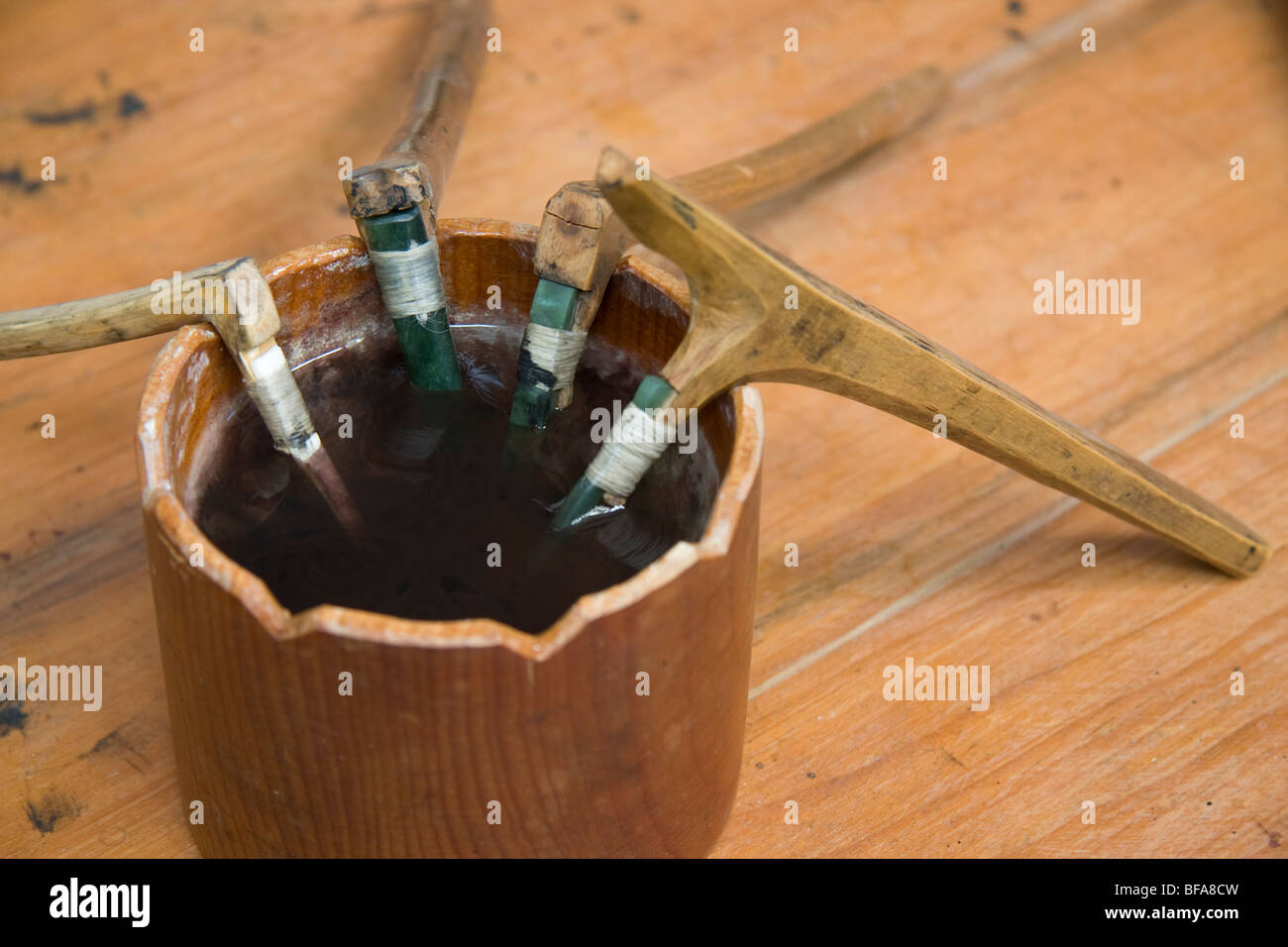 The tools for moko: Chisels dipped in water to clean off the ink after ...