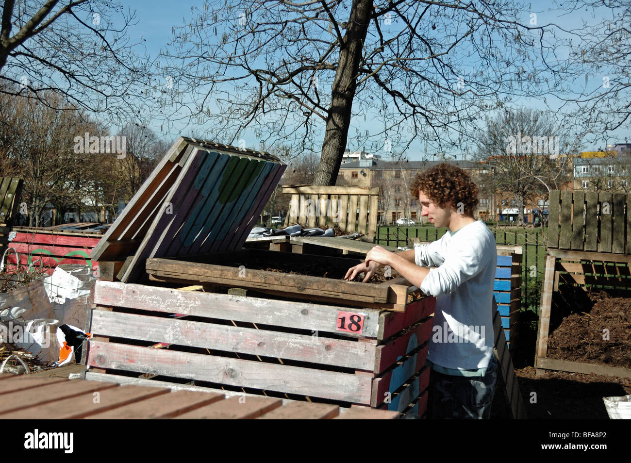 Man testing compost at Freightliners Farm Holloway London England UK ...