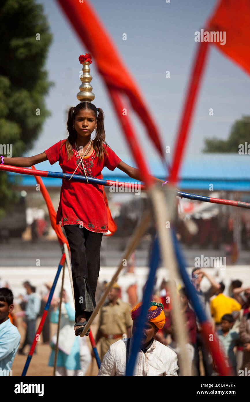 Tightrope walking at the Camel Fair in Pushkar India Stock Photo - Alamy