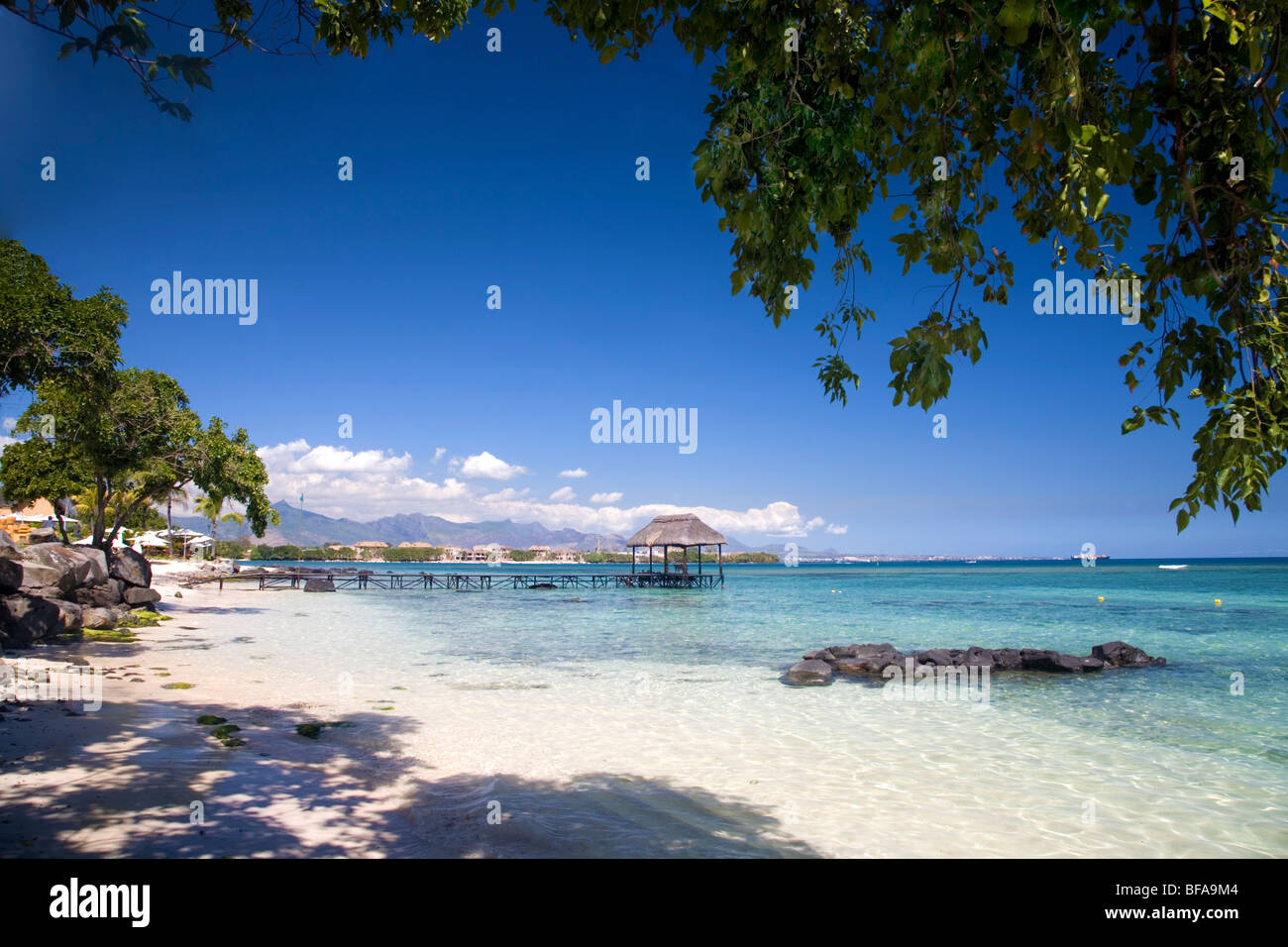 Pier at The Oberoi Hotel beach, Pointe aux Piments, Mauritius Stock ...