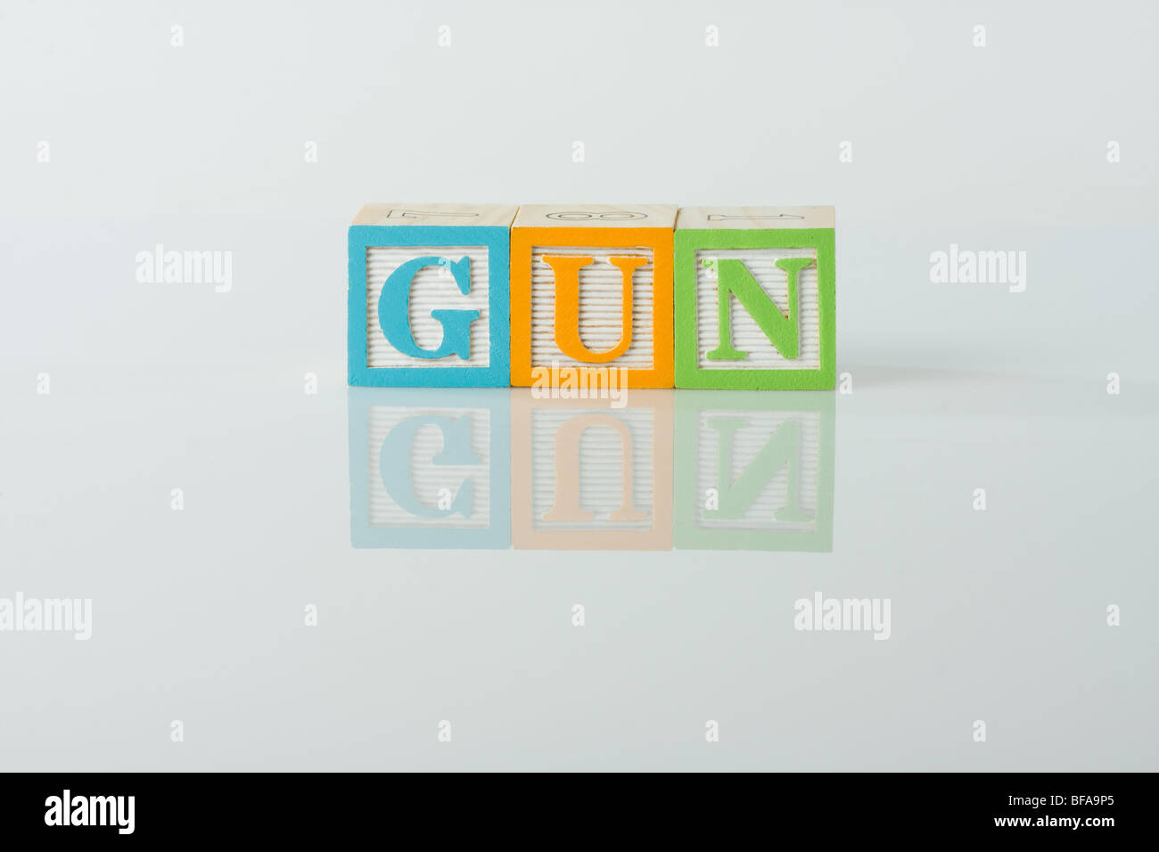 Childs Block Letter Word - Gun Stock Photo - Alamy