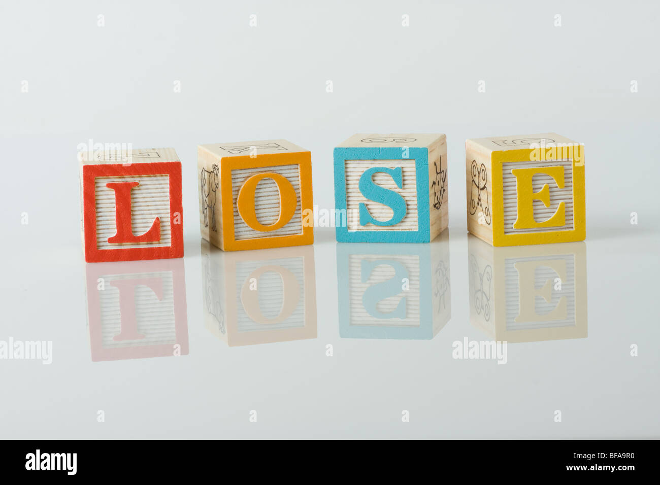 Childs Block Letter Word - Lose Stock Photo - Alamy
