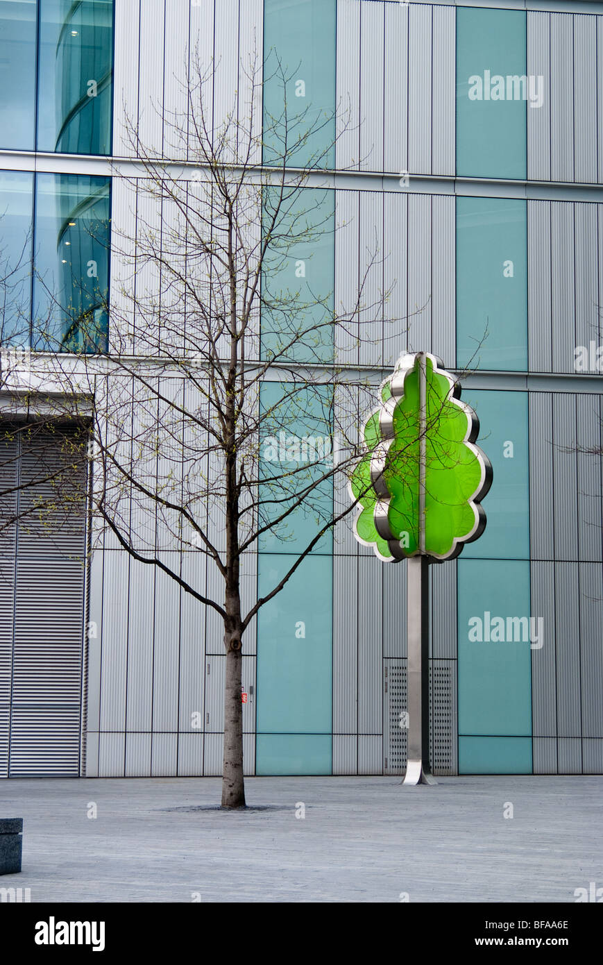 Evergreen. A neon green tree, designed by David Batchelor, stands next ...