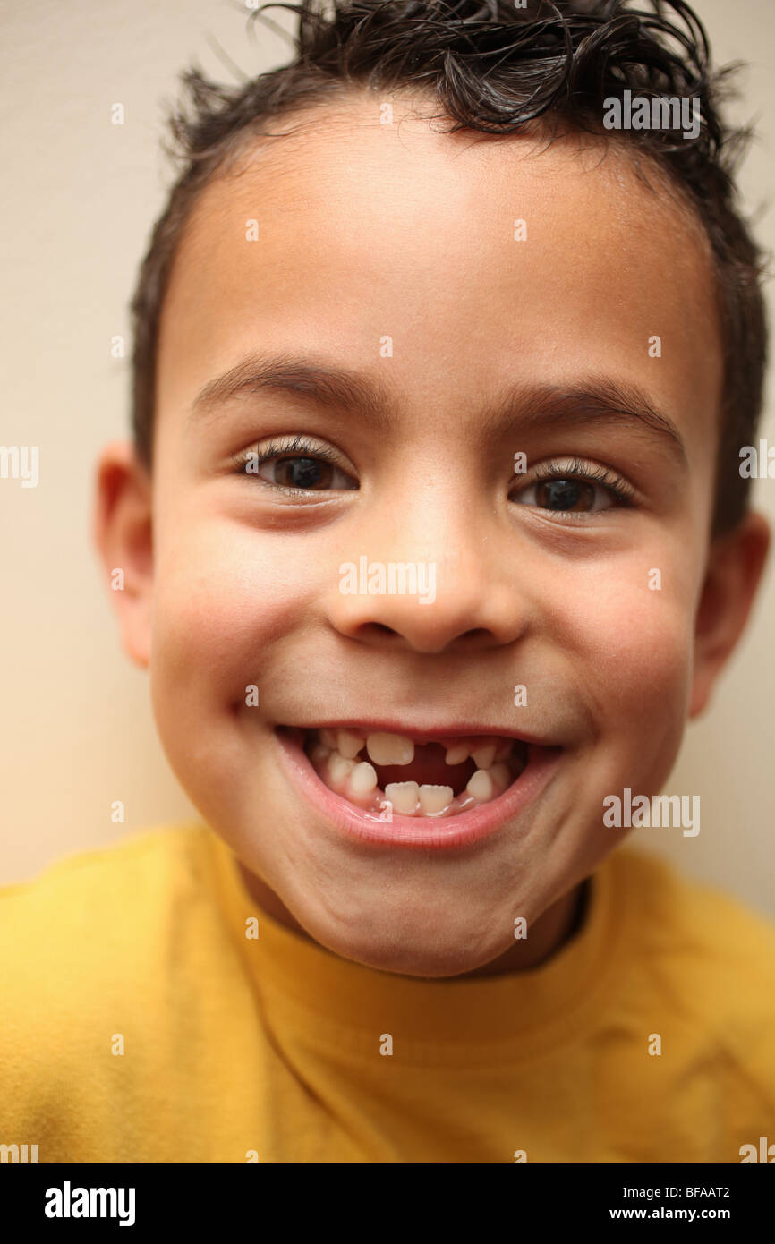 Boy smiling with 2nd set of teeth Stock Photo - Alamy