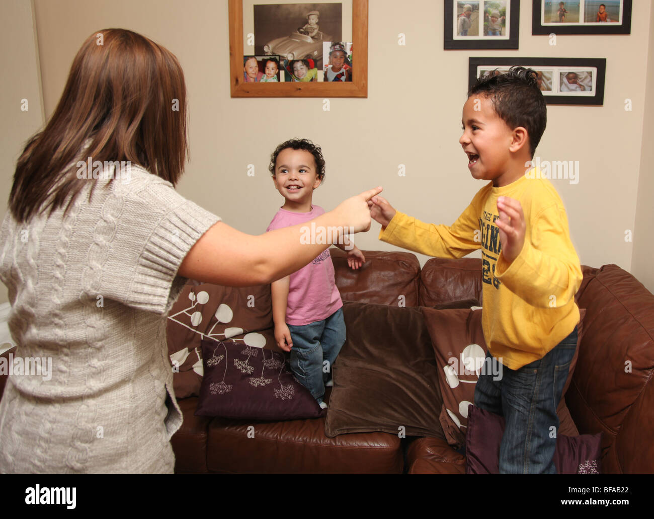 Mum fighting with kids Stock Photo - Alamy
