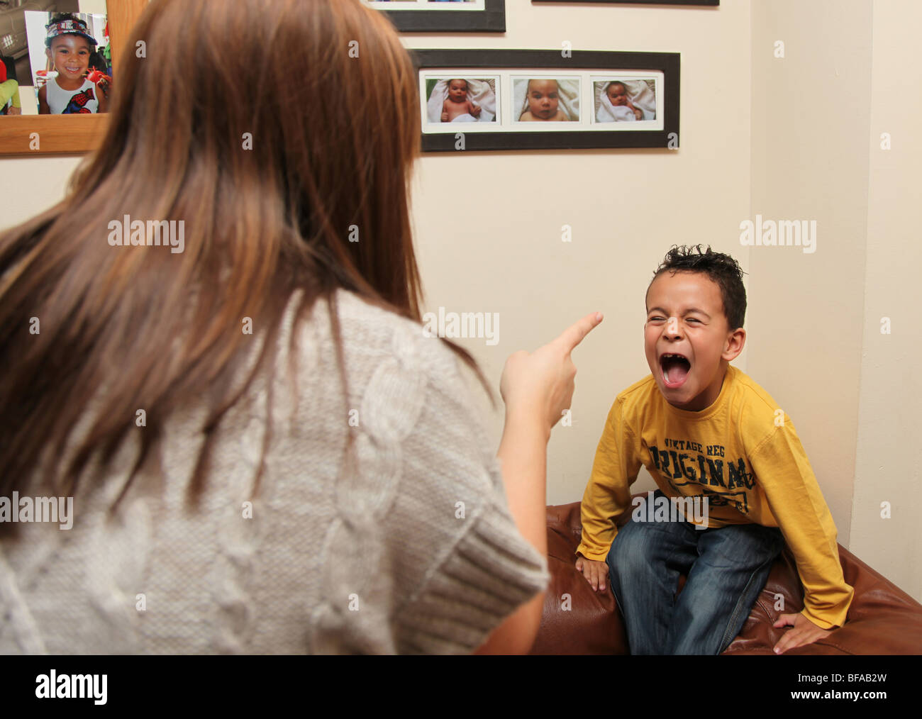 Mum telling off toddler Stock Photo - Alamy