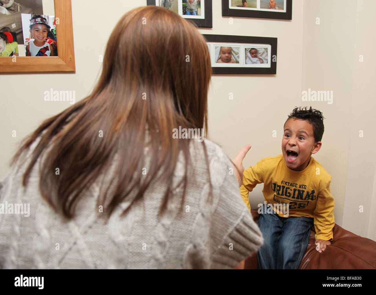 Mum telling off toddler Stock Photo - Alamy