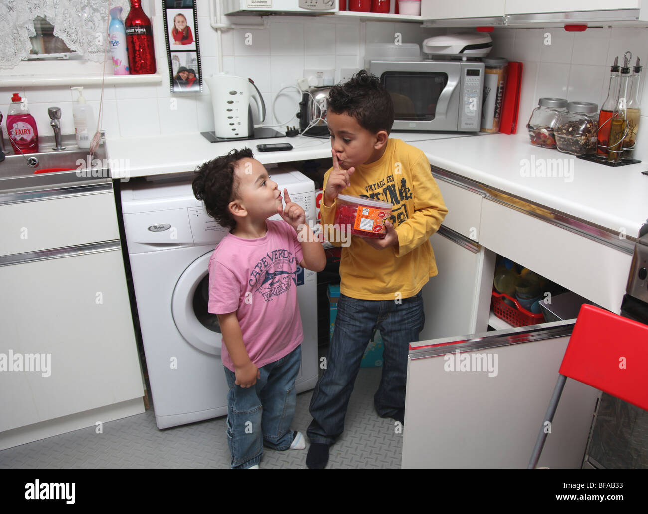 Boys stealing hi-res stock photography and images - Alamy