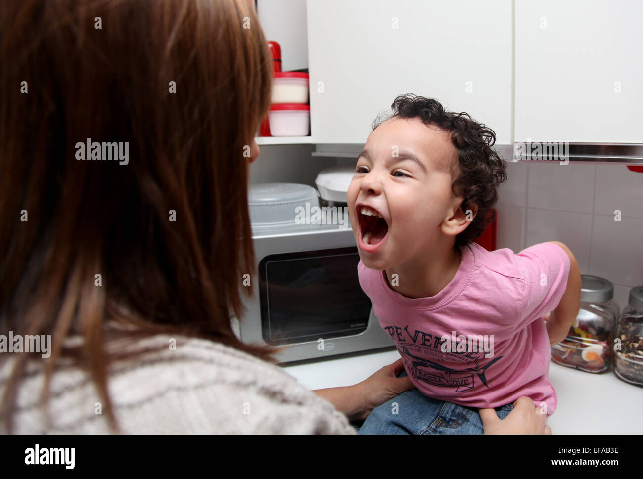 Parents with boisterous children hi-res stock photography and images ...