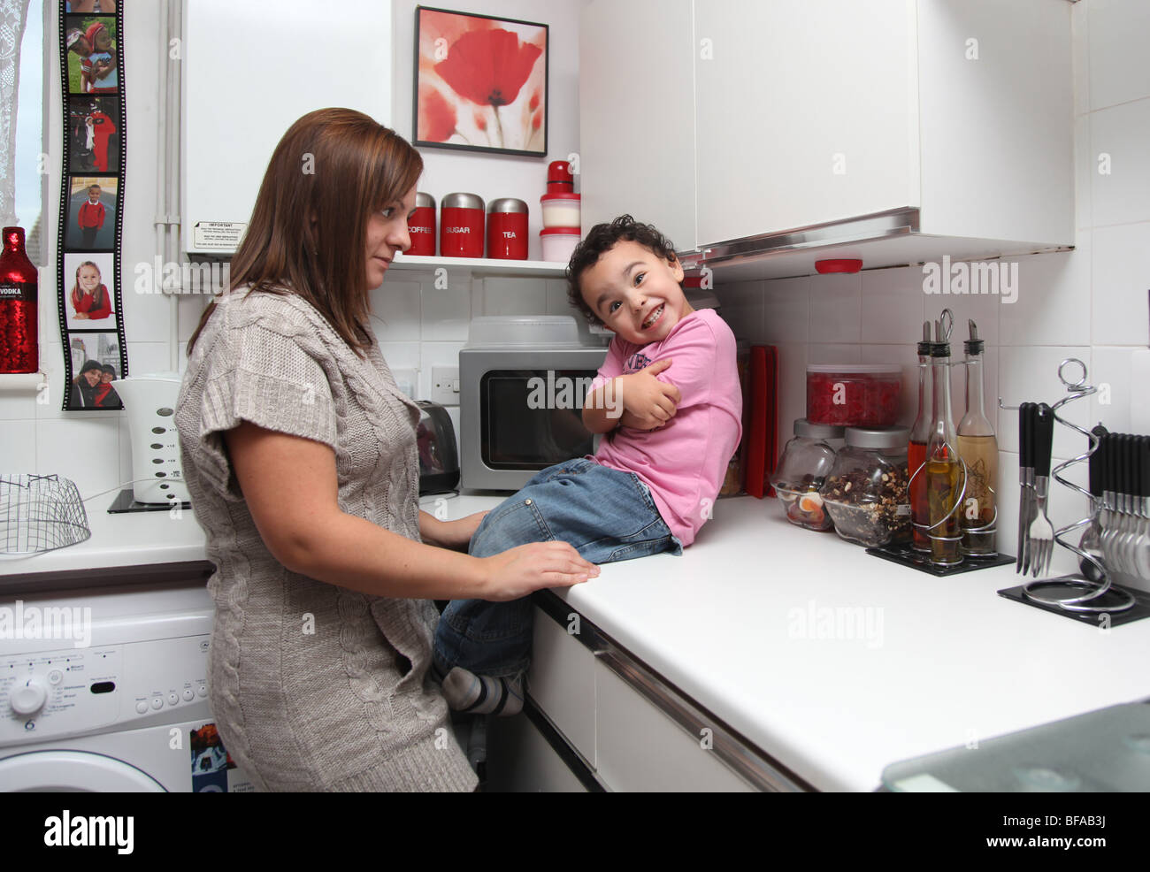 Mum telling off toddler Stock Photo - Alamy