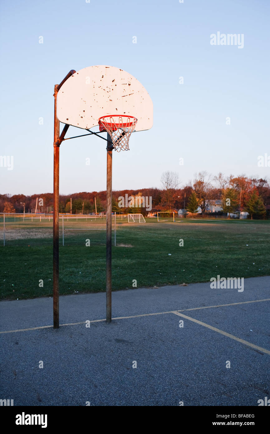 A basketball hoop at a playground Stock Photo - Alamy