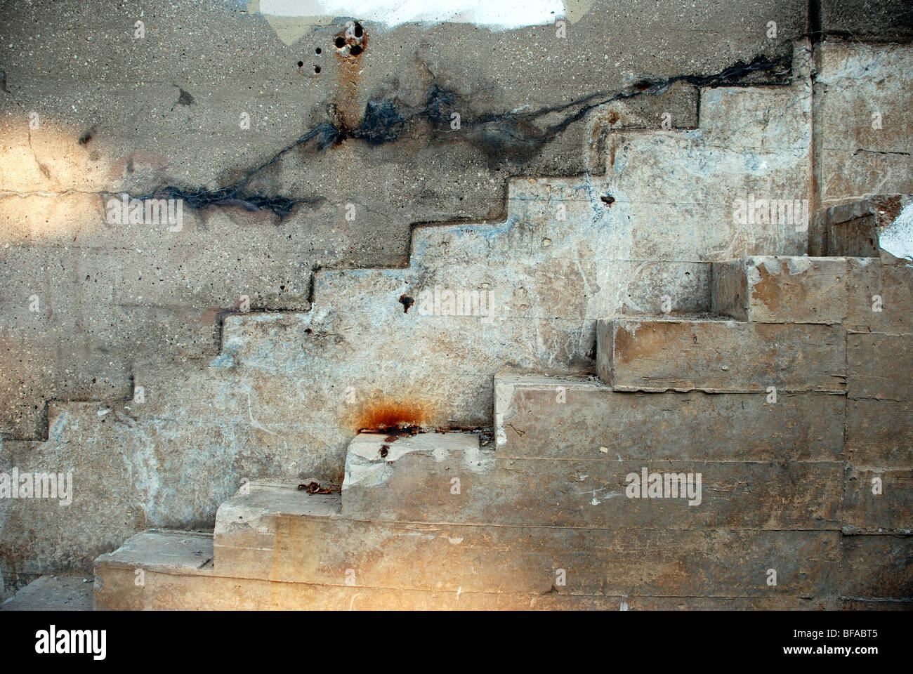 Concrete stairs on concrete wall Stock Photo - Alamy