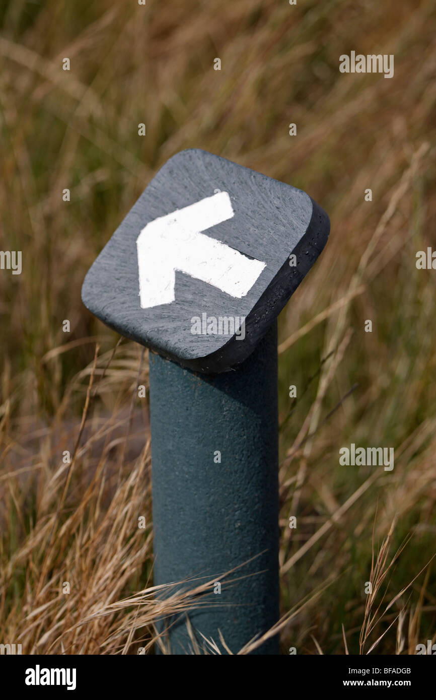 Arrow marking footpath for hikers Stock Photo - Alamy