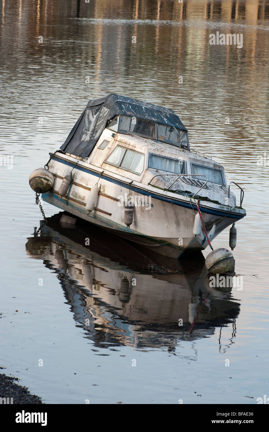 A pleasure boat on the Thames covered in bird droppings at low time ...