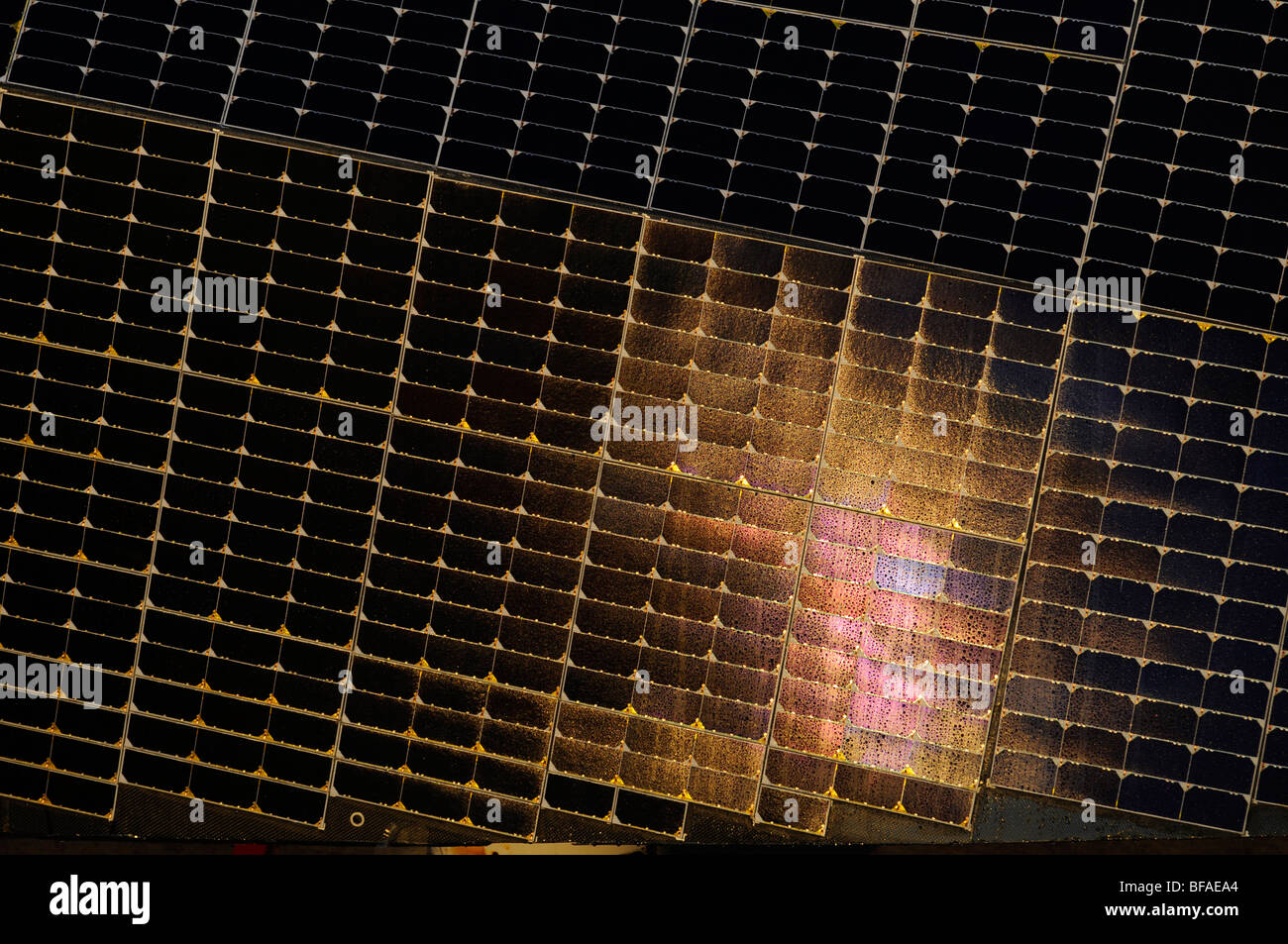 Close up of the sun reflected on photovoltaik cells, commonly called ...