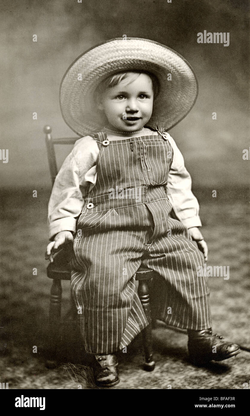 Cute Little Boy in Farmboy Outfit Stock Photo - Alamy