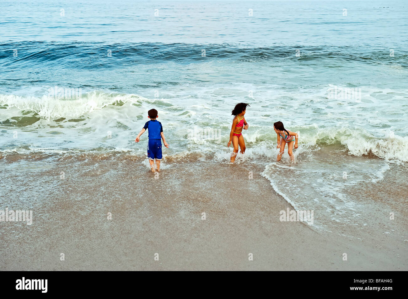 Children enjoying water play hi-res stock photography and images - Alamy