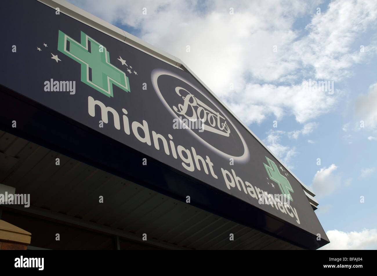 Sign outside boots midnight pharmacy shop store in the uk hi-res stock ...