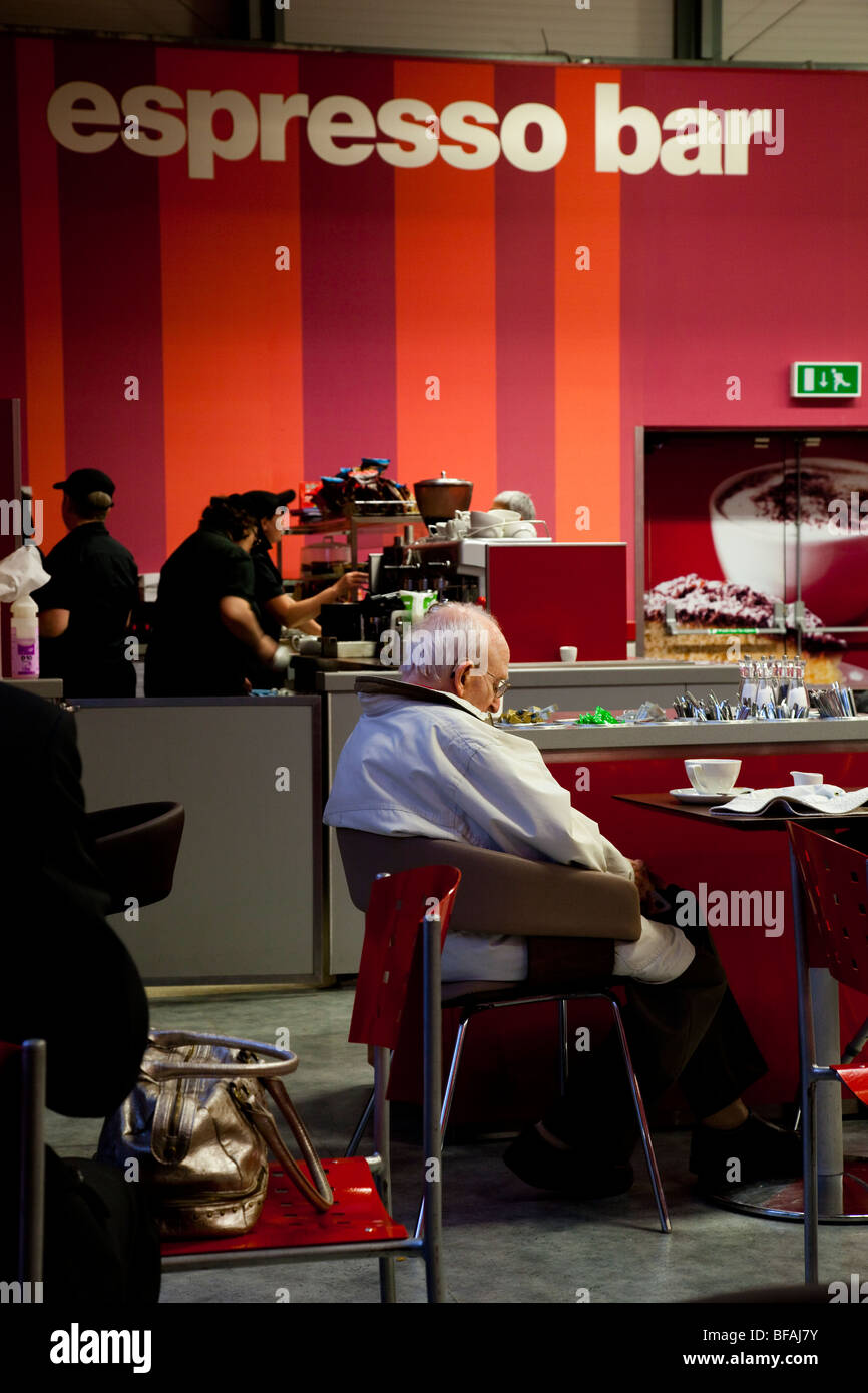 Old man asleep in Coffee bar Stock Photo - Alamy