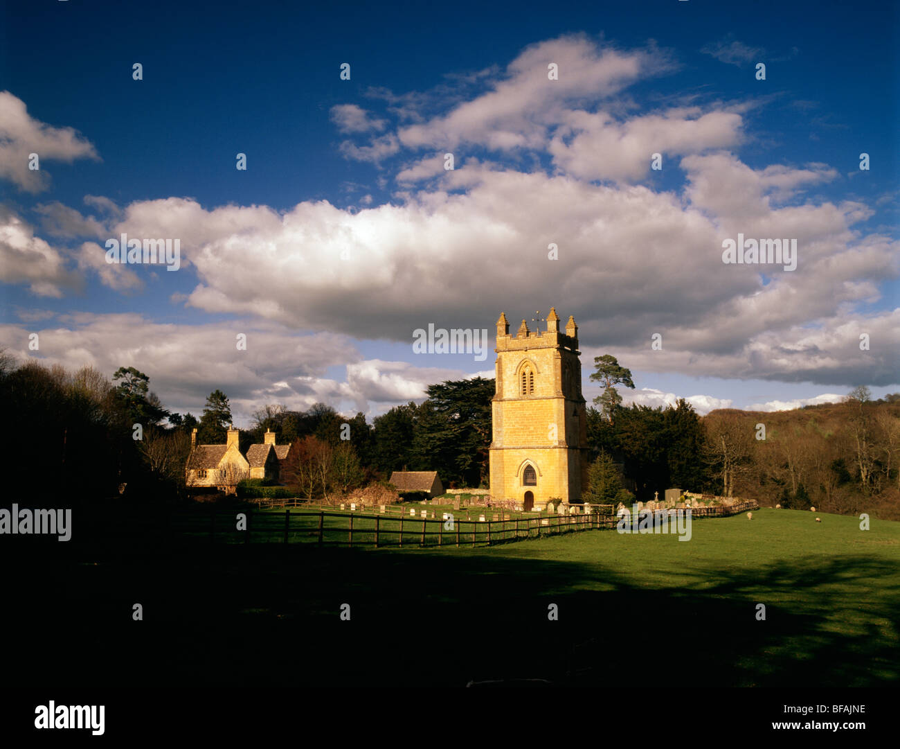 Sunlit view of St Mary's Church Temple Guiting Gloucestershire Stock ...