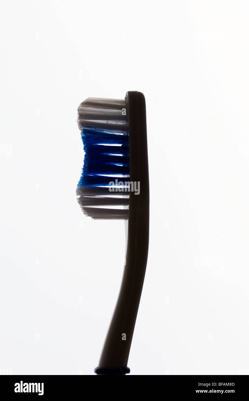 Silhouette of a toothbrush against a white background Stock Photo - Alamy