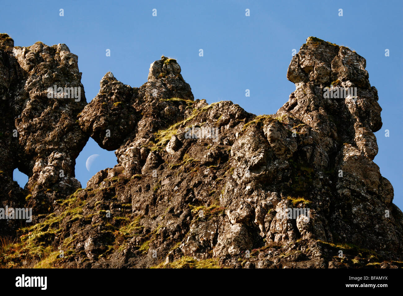 Moon rock. The moon through the rocks at the old man of Storr,Isle of ...