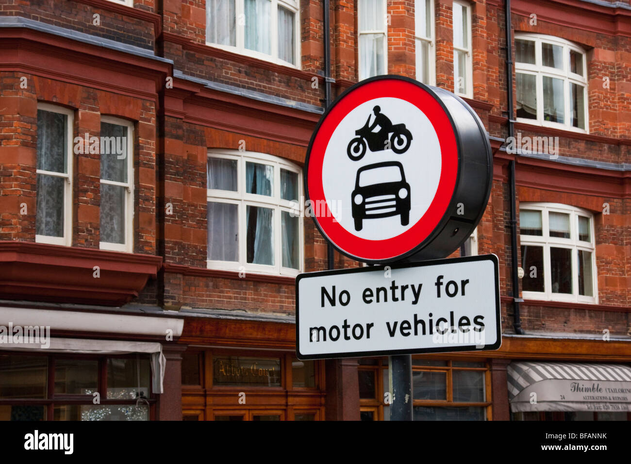 No Entry sign for cars and motorbikes in London side street Stock Photo ...