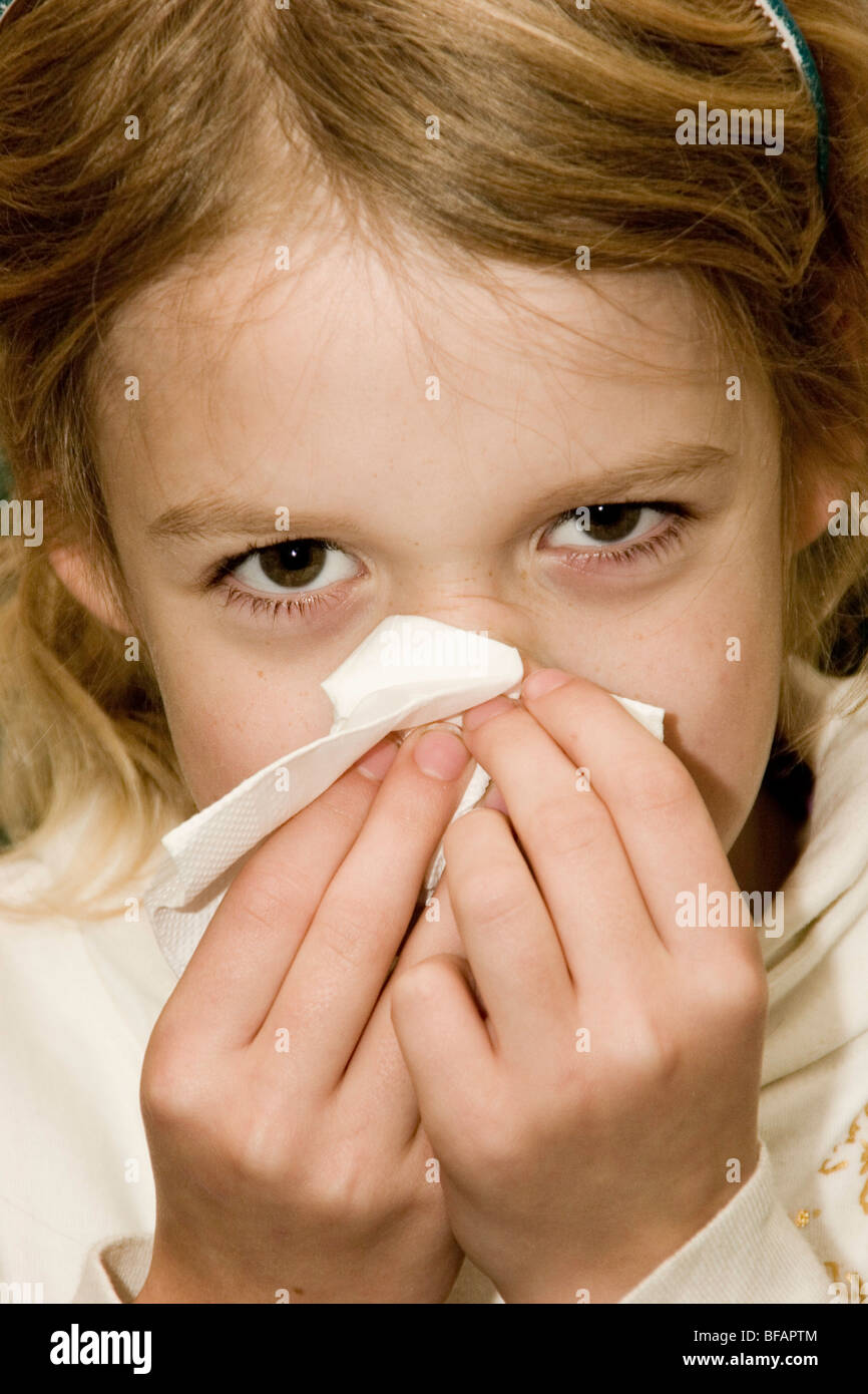 young girl sneezing Stock Photo - Alamy