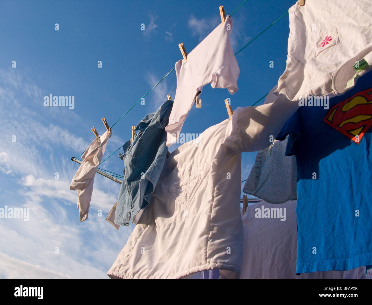 Clean laundry drying on outdoor clothes line Stock Photo - Alamy