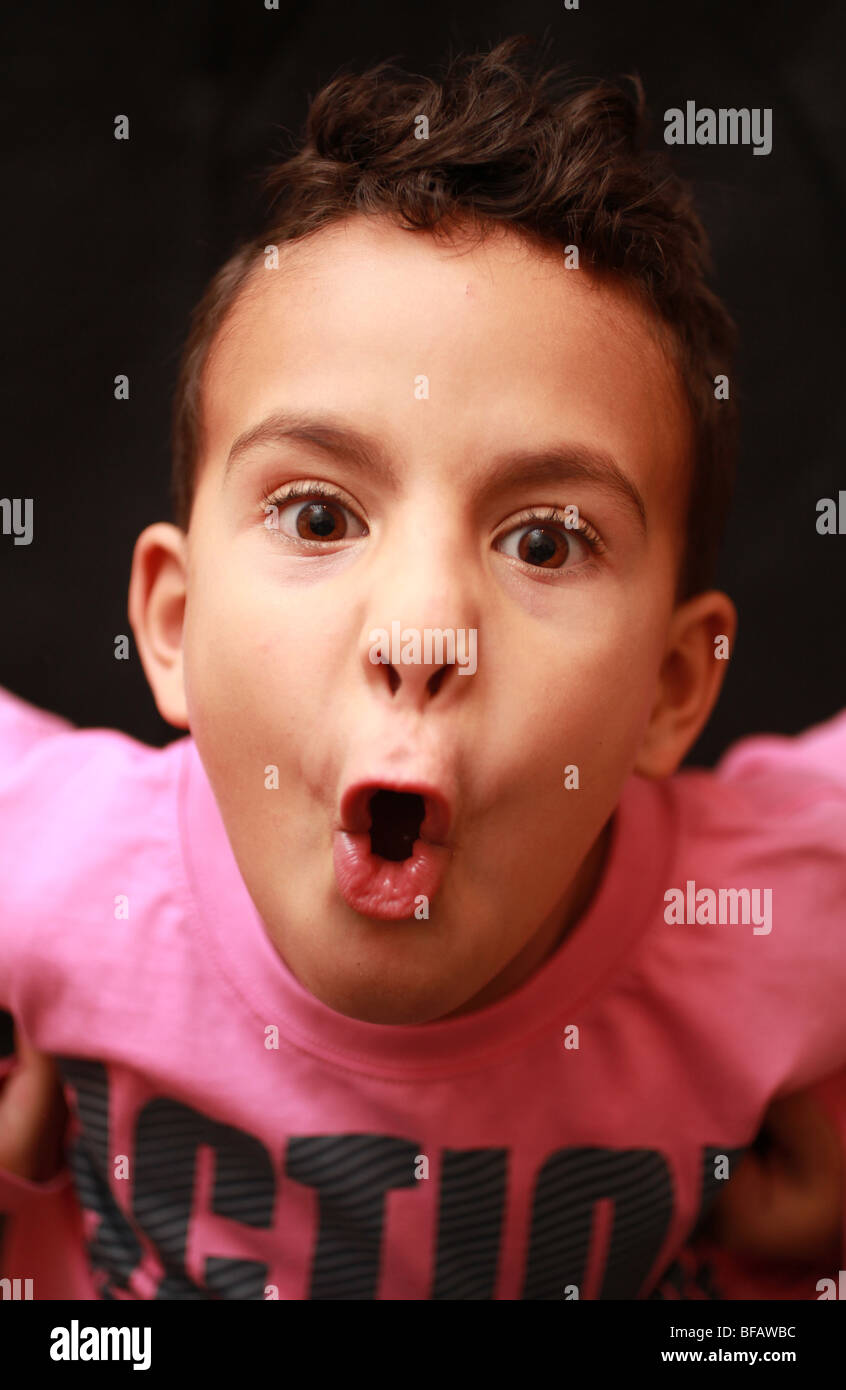 Cheeky 5 year old boy Stock Photo - Alamy