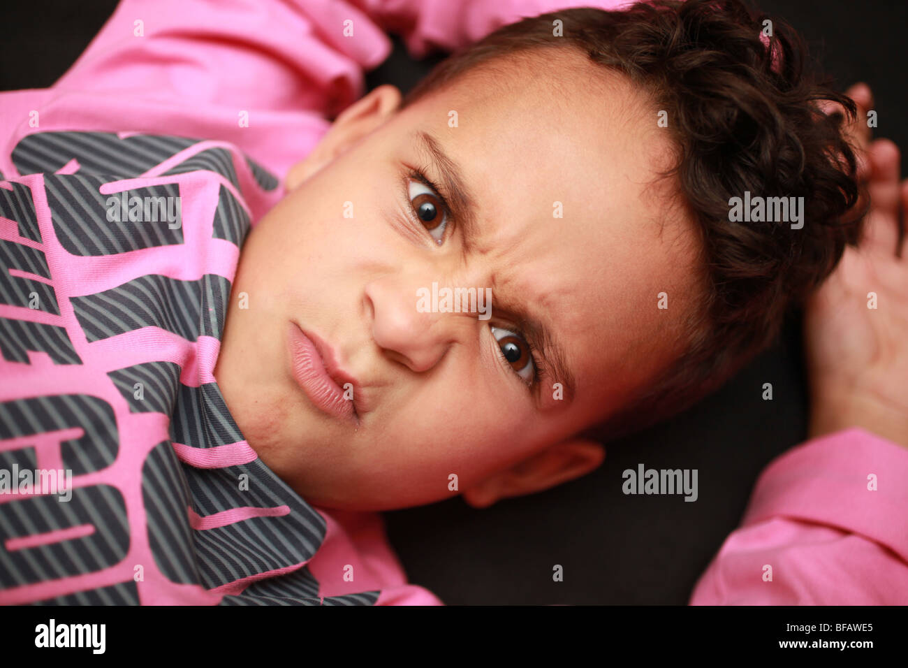 Cheeky 5 year old boy Stock Photo - Alamy