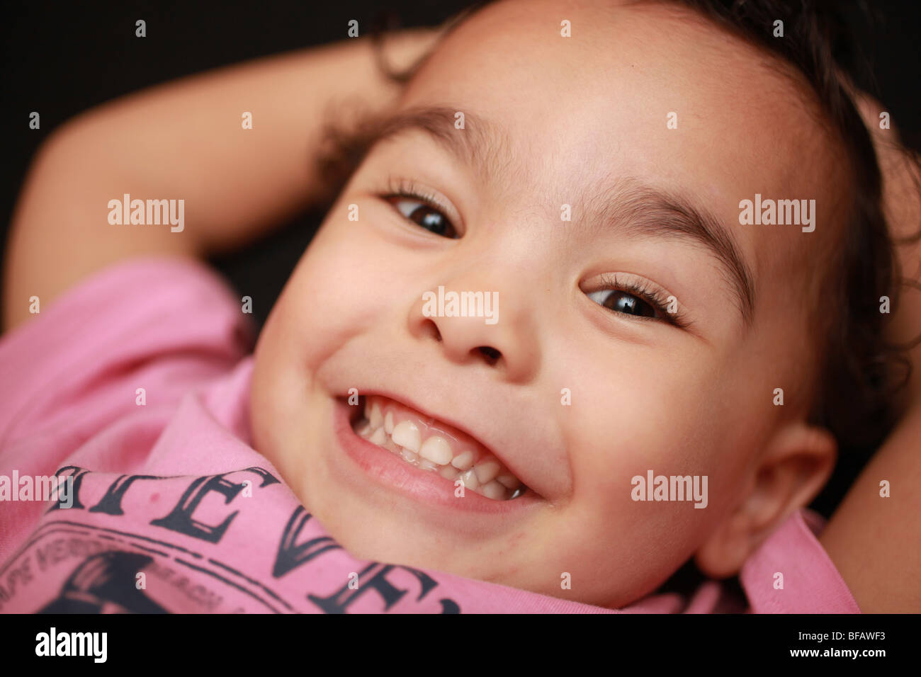 Child smiling at camera Stock Photo - Alamy